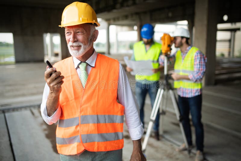 Construction Engineers Discussion with Architects at Construction or ...