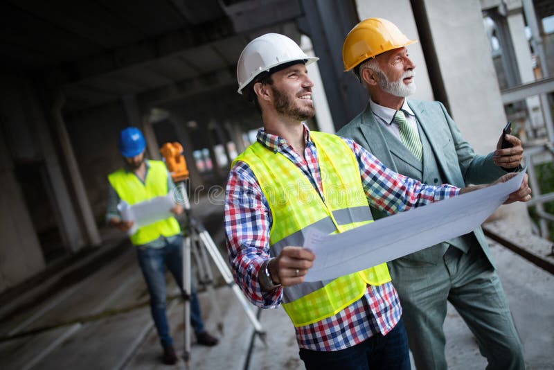 Construction Engineers Discussion with Architects at Construction or ...