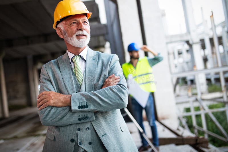 Construction Engineers Discussion with Architects at Construction or ...