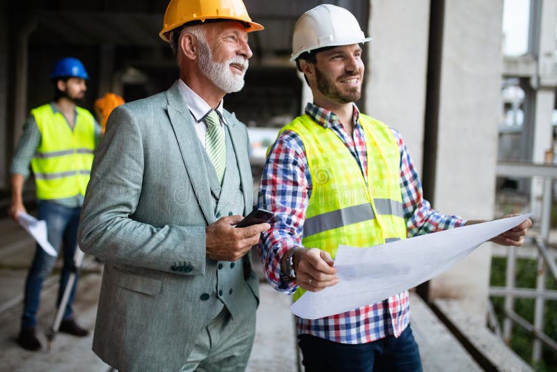 Construction Engineers Discussion with Architects at Construction or ...