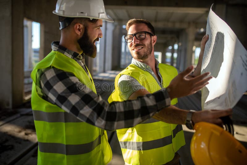 Construction Engineers Discussion with Architects at Construction or ...