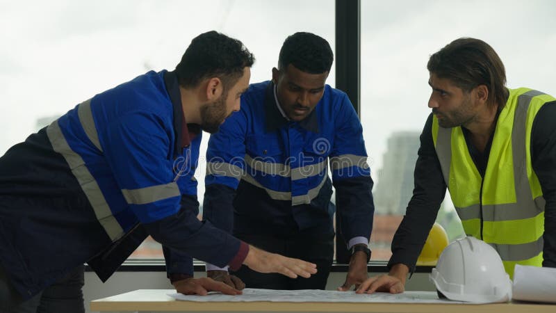 Construction Engineers Team Using Blueprint of Project Plan ...