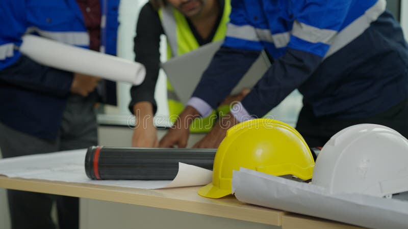 Construction Engineers Team Using Blueprint of Project Plan ...