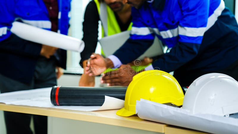 Construction Engineers Team Using Blueprint of Project Plan ...