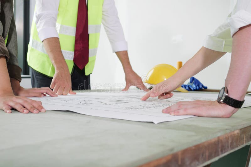 Construction Engineers Team Using Blueprint of Project Plan Stock Image ...
