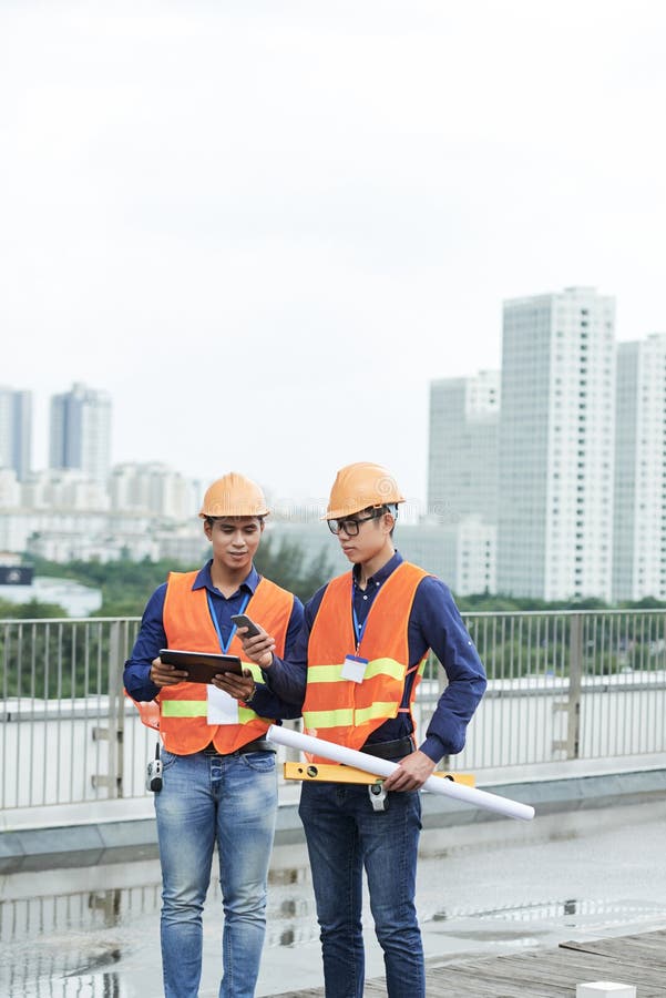 Construction Engineers at Work Stock Image - Image of application ...