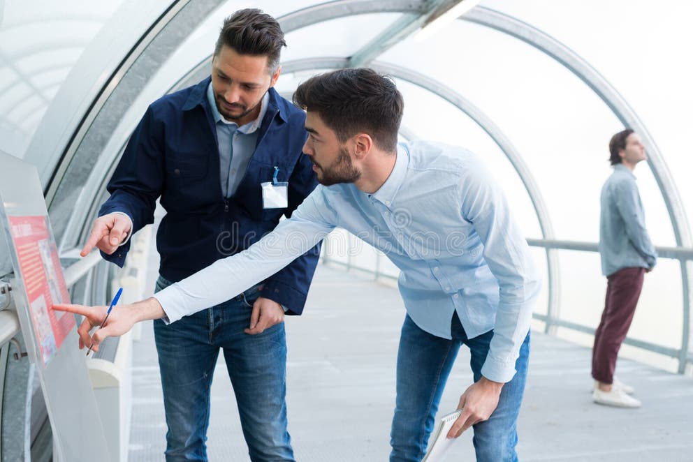 Construction Engineers Working on Building Site Stock Image - Image of ...
