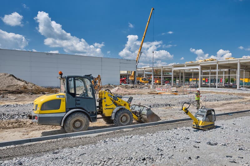 Construction Equipment at the Construction Site Building Gallery Mall Stock Image - Image of ...