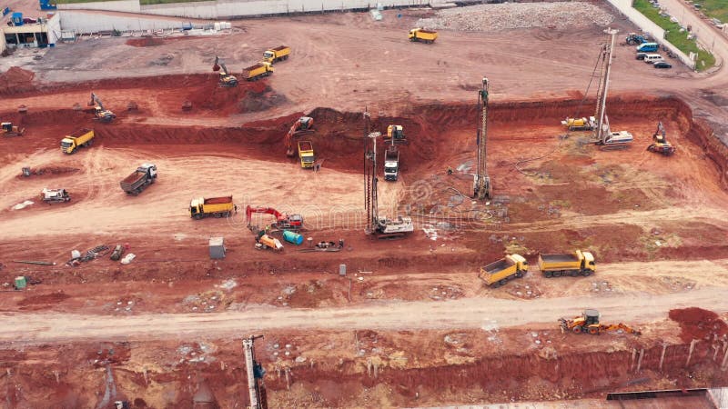 Construction Equipment Works on Construction Site: Excavators, Trucks ...
