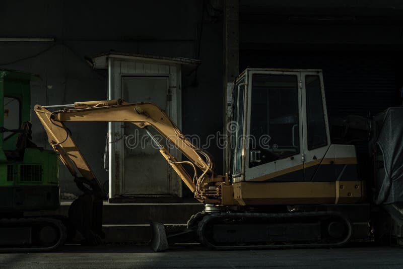 A Construction Excavator of Yellow Color for the Construction Site ...