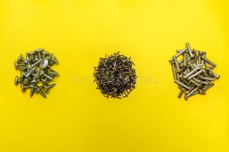 Construction Fasteners on a Yellow Background Stock Photo - Image of ...