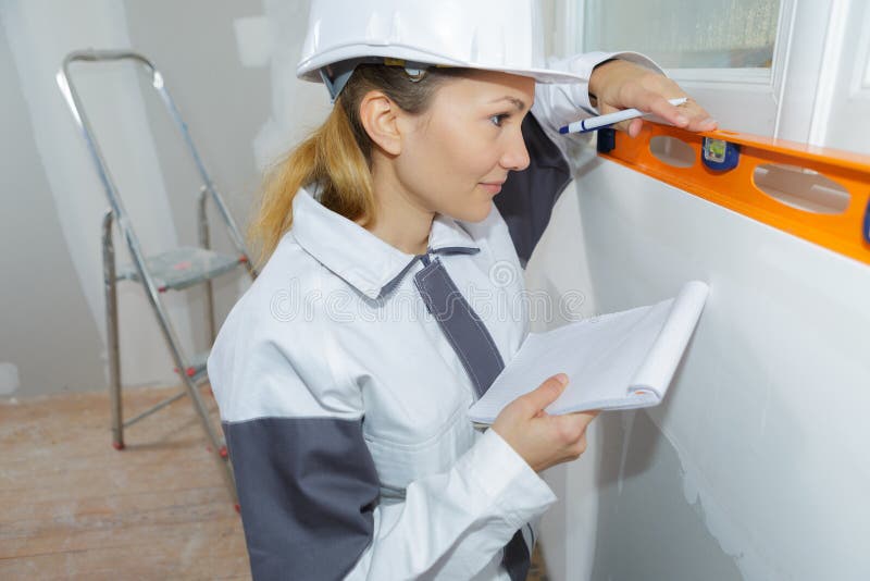 Construction Female Worker with Level Tool Stock Photo - Image of ...
