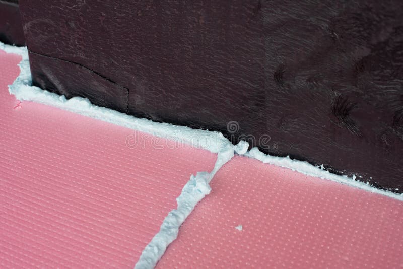 Construction Foam between Pink Extruded Styrofoam Sheets Stock Image ...