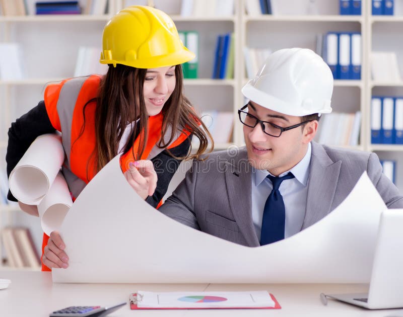 Construction Foreman Supervisor Reviewing Drawings Stock Photo - Image ...