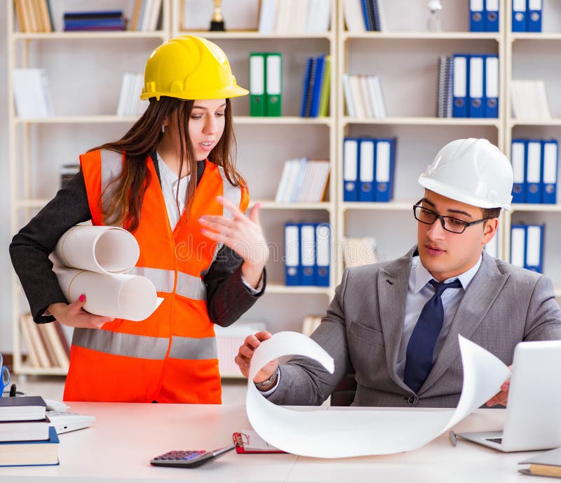 Construction Foreman Supervisor Reviewing Drawings Stock Photo - Image ...