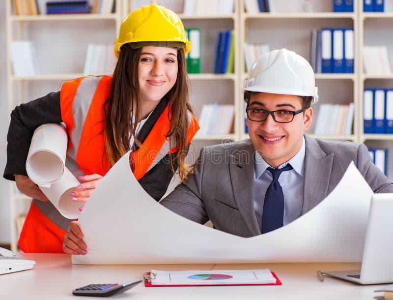 Construction Foreman Supervisor Reviewing Drawings Stock Image - Image ...