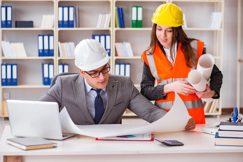 The Construction Foreman Supervisor Reviewing Drawings Stock Image ...
