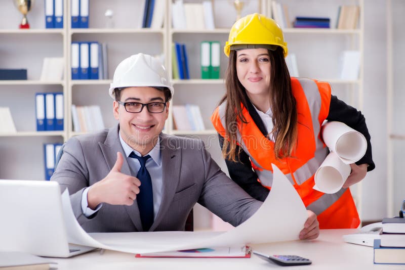 Supervisor Reviewing Work of Seamstress Stock Photo - Image of cute ...