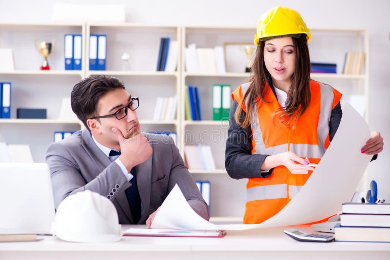 The Construction Foreman Supervisor Reviewing Drawings Stock Image ...