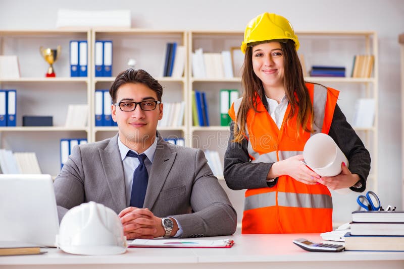 The Construction Foreman Supervisor Reviewing Drawings Stock Image ...