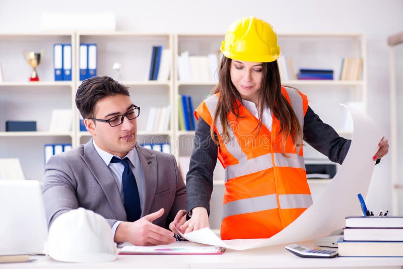 The Construction Foreman Supervisor Reviewing Drawings Stock Image ...