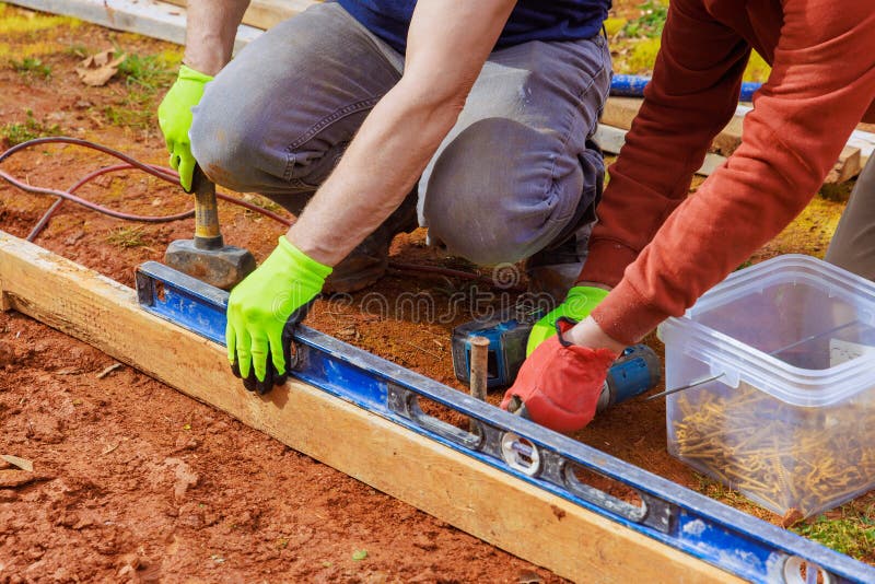 Construction of Formwork for a Concrete Base Foundation House Using ...