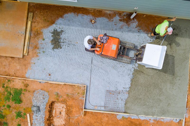 Construction of Foundation Involves Pouring of Wet Cement into ...