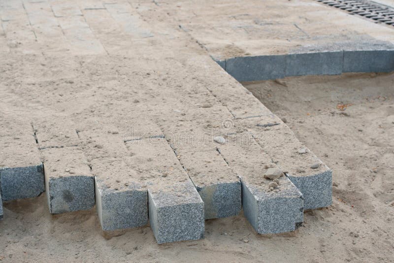 Construction of a Granite Pavement with Grey Regular and Even Stone ...