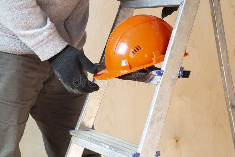 Construction Helmet of Orange Light.Safety during Construction Stock ...