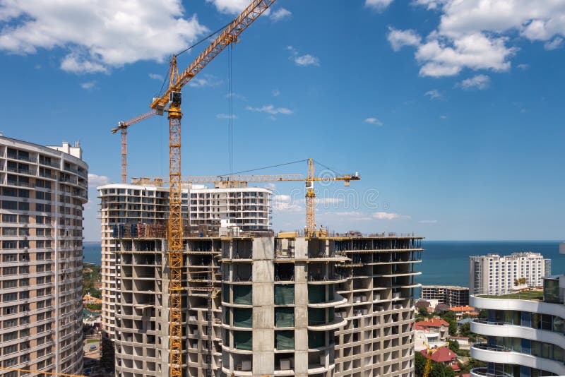 The Construction of a High-rise Apartment Building on the Seashore ...