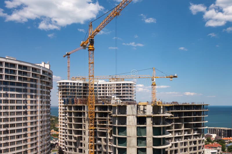 The Construction of a High-rise Apartment Building on the Seashore ...