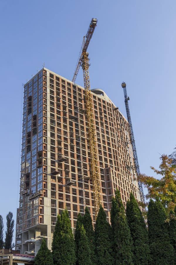 Construction of a High-rise Building, Construction Crane. Blue Sky ...