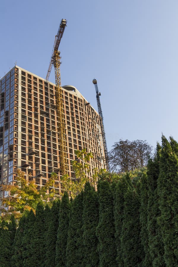 Construction of a High-rise Building, Construction Crane. Blue Sky ...