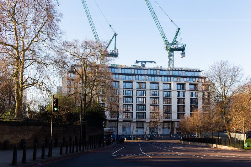Construction of High-rise Building. Construction Cranes and Skyscraper ...