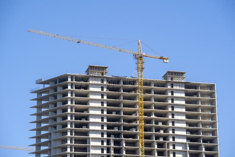 Construction of a High-rise Building with a Crane. the Construction ...