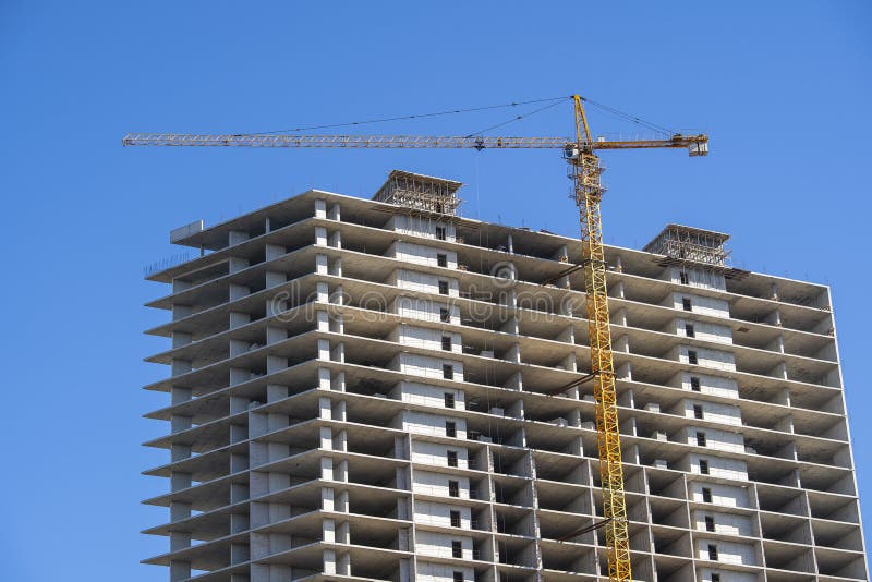 Construction of a High-rise Building with a Crane. the Construction ...