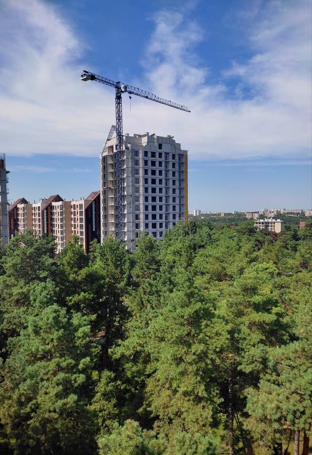 Construction of a High-rise Building with a Crane Stock Image - Image ...