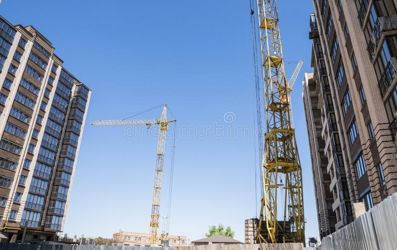 Construction of a High-rise Building with a Crane. Building ...