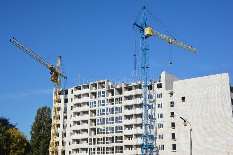 Construction of a High-rise Building with a Construction Cranes ...