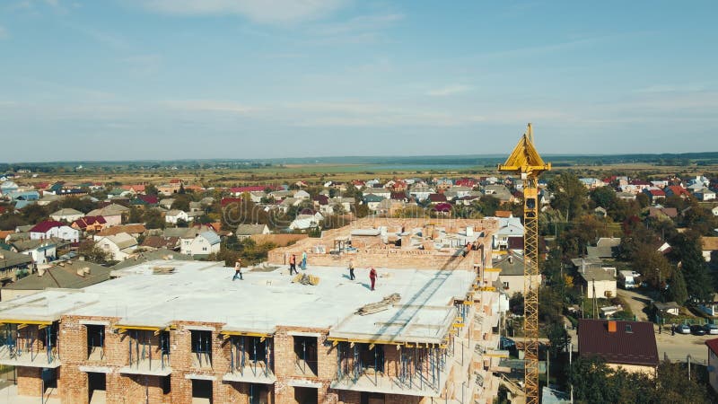 A Flight Over a High-rise Red Brick Building with Inset Windows without ...