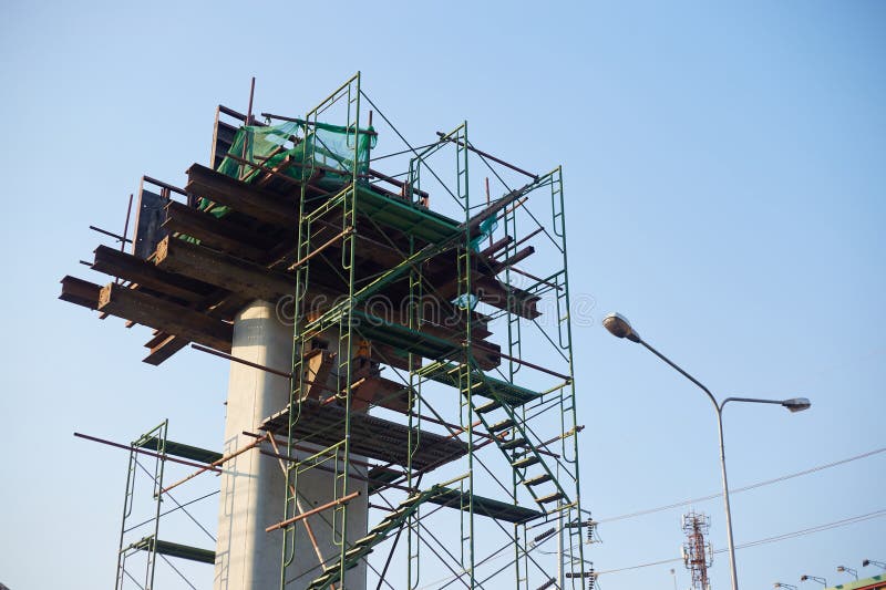 Construction of a High-rise Building with Scaffolding and Construction ...