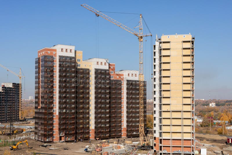 Construction of High-rise Residential Building. Cranes Working on ...