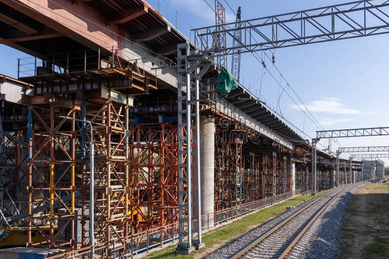 Construction of a High Road Overpass Along the Railway. Modern ...