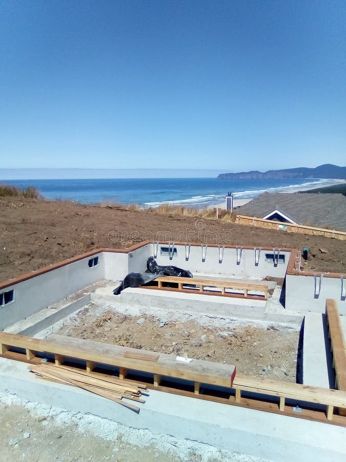 Construction on hillside stock photo. Image of ocean - 163157402