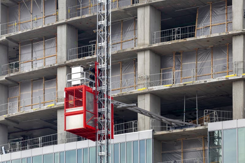 Construction Hoists Lift Elevator for Workers and Material Stock Photo ...