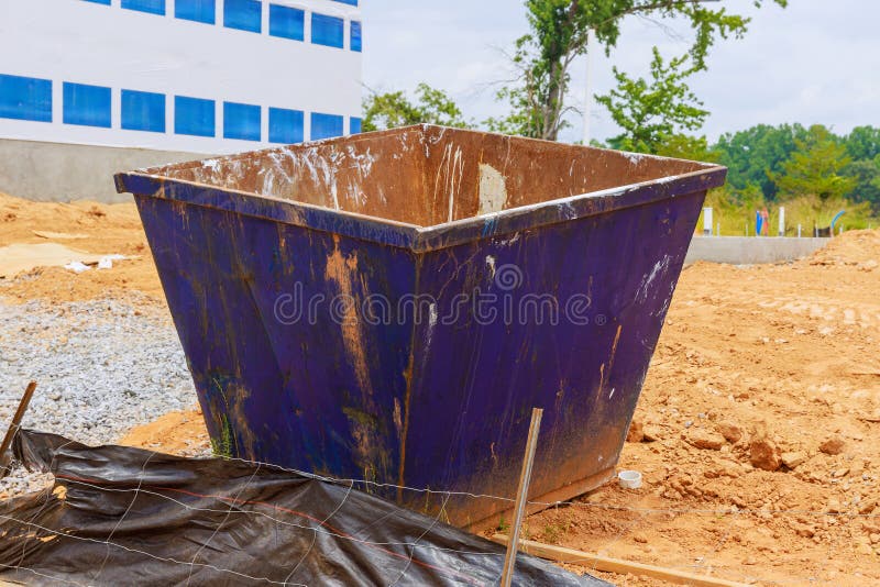 During Construction a House, Garbage Metal Containers are Used for ...