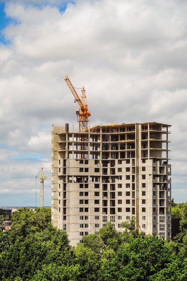 Construction of House. High-rise Tower Crane with a Multi-storey ...