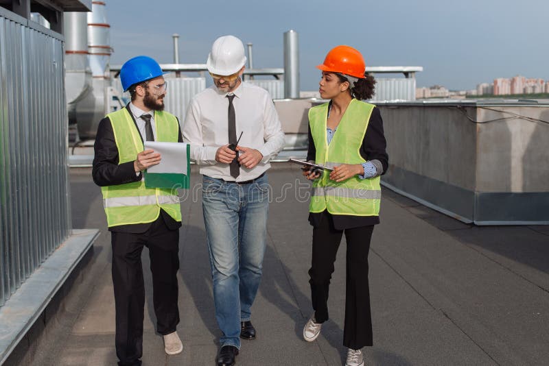 Construction Industry Group of Engineer and Architect Analyzing the ...