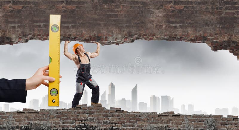 Bricklayer Lifting Up a Brick Stock Photo - Image of house, mason: 38271968