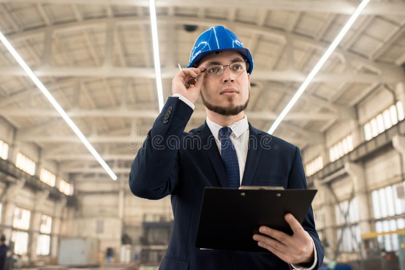 Construction Inspector Examining Building Structure Stock Photo - Image ...
